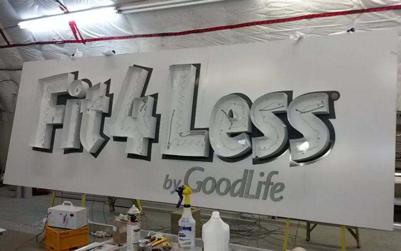 Fit 4 Less - Universal Sign Group